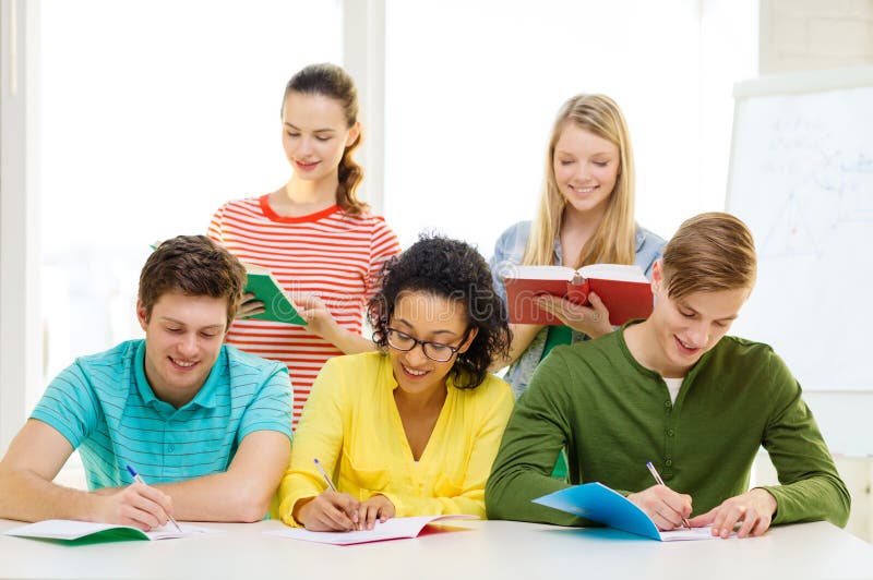 Students with Textbooks and Books at School Stock Image - Image of ...