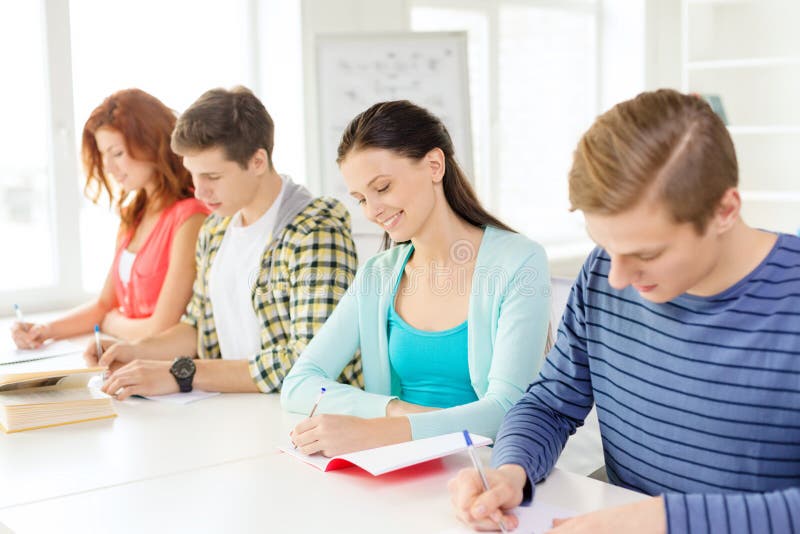 Students with Textbooks and Books at School Stock Photo - Image of ...
