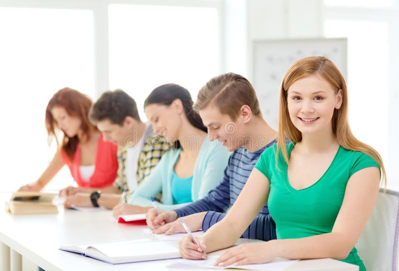 Students with Textbooks and Books at School Stock Image - Image of ...