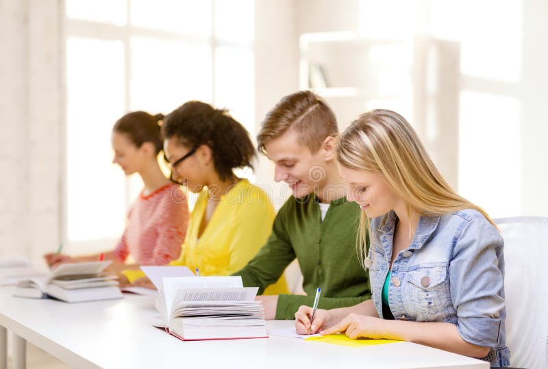 Students with Textbooks and Books at School Stock Image - Image of ...
