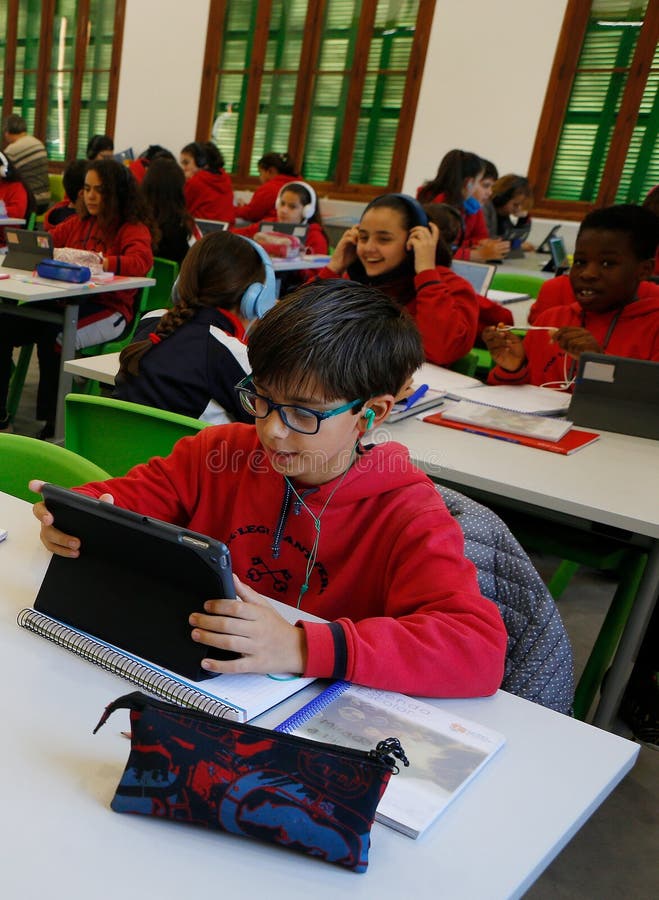 Students in Classroom Using Technology Vertical Editorial Stock Photo ...