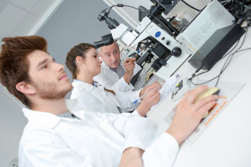 Students with Their Professor in Laboratory Stock Image - Image of ...