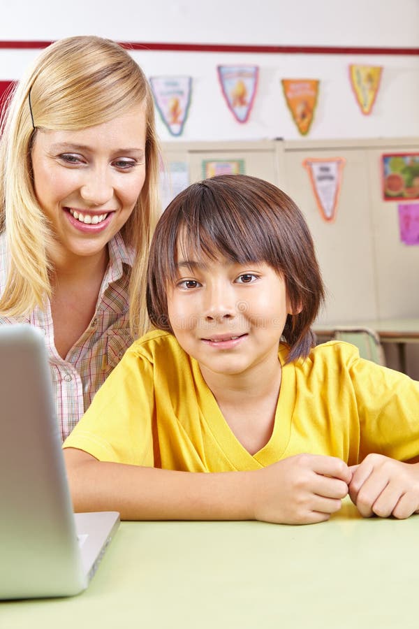 Students at Tutoring with Teacher and Laptop Stock Image - Image of ...