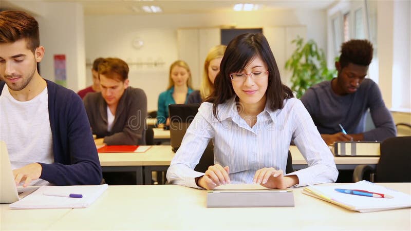 Students Typing on Tablet Computer and Laptop Stock Footage - Video of ...