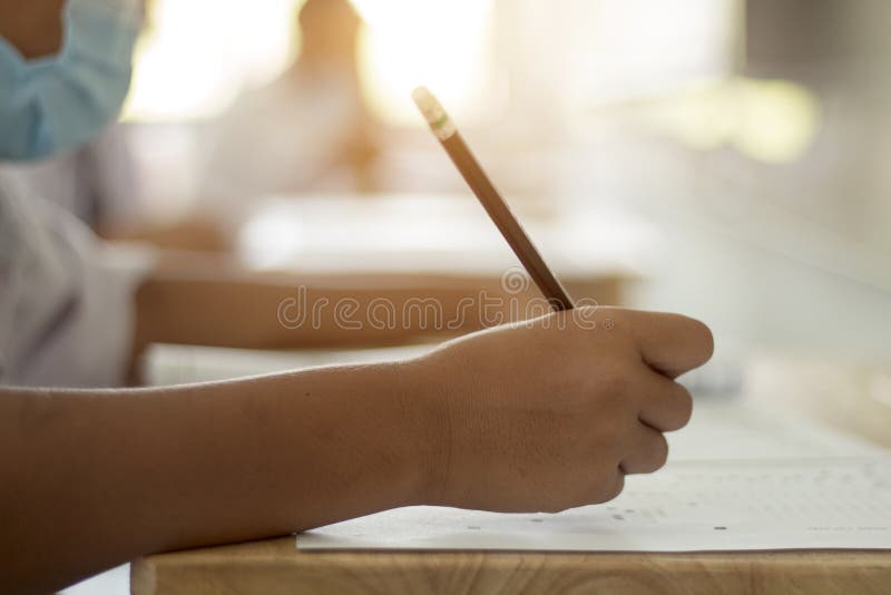 Students in Uniform are Doing the Test in the Classroom Stock Image ...