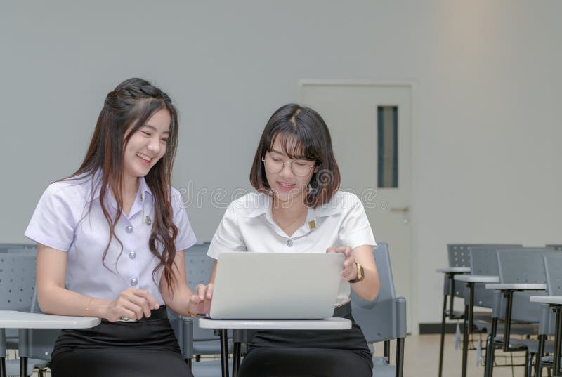 Students in Uniform Working with Laptop Stock Photo - Image of lovely ...