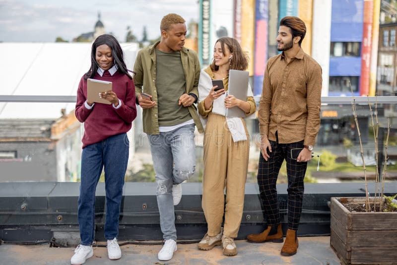 Students Use Digital Devices at University Campus Stock Photo - Image ...