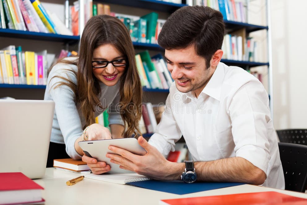 Students Using a Digital Tablet Stock Image - Image of literature ...