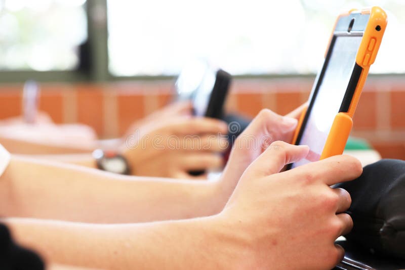 Students Using Digital Technology in the Classroom. Stock Photo - Image ...