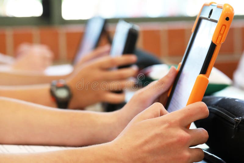Students Using Digital Technology in the Classroom. Stock Photo - Image ...