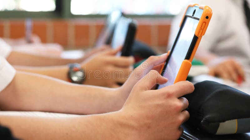 Students Using Digital Technology in the Classroom. Stock Photo - Image ...