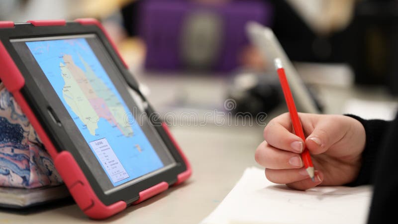 Students Using Digital Technology in the Classroom. Stock Photo - Image ...