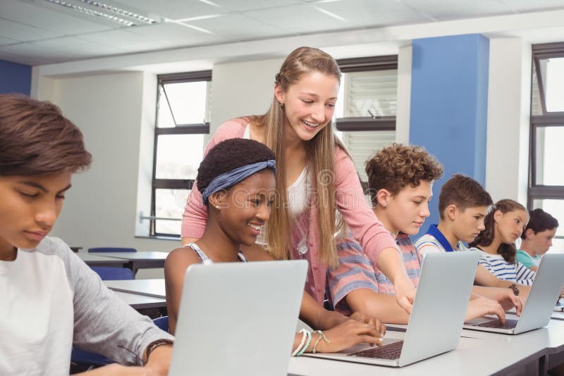 Students Using Laptop in Classroom Stock Image - Image of female ...
