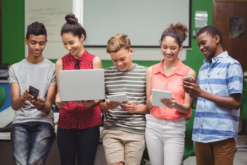 Students Using Laptop, Mobile Phone, Digital Tablet Stock Image - Image ...