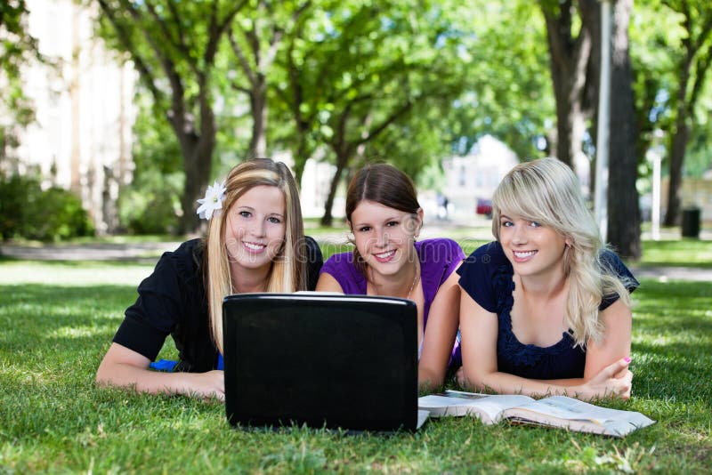 Happy College Students Using Computer Stock Image - Image of notebook ...