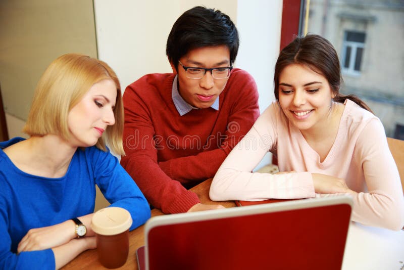 Students Using Laptop Together Stock Image - Image of sitting, multi ...
