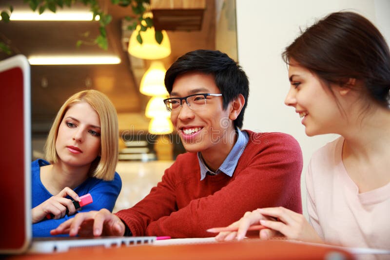 Students Using Laptop Together Stock Photo - Image of multi, friendship ...