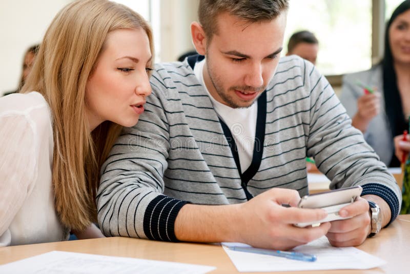 Students Using Phone during Class Stock Image - Image of colleagues ...