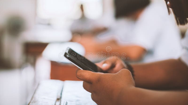 Students Using Smartphones during the Lecture in the Classroom Stock ...