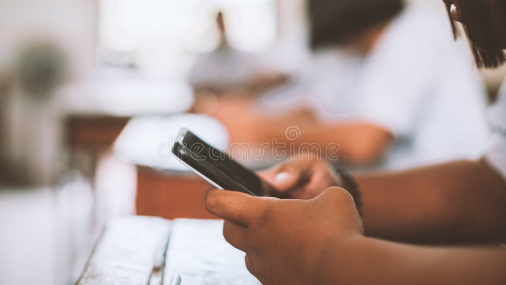 Students Using Smartphones during the Lecture in the Classroom Stock ...
