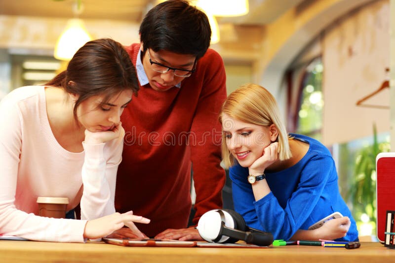 Students Using Tablet Computer Together Stock Image - Image of ...