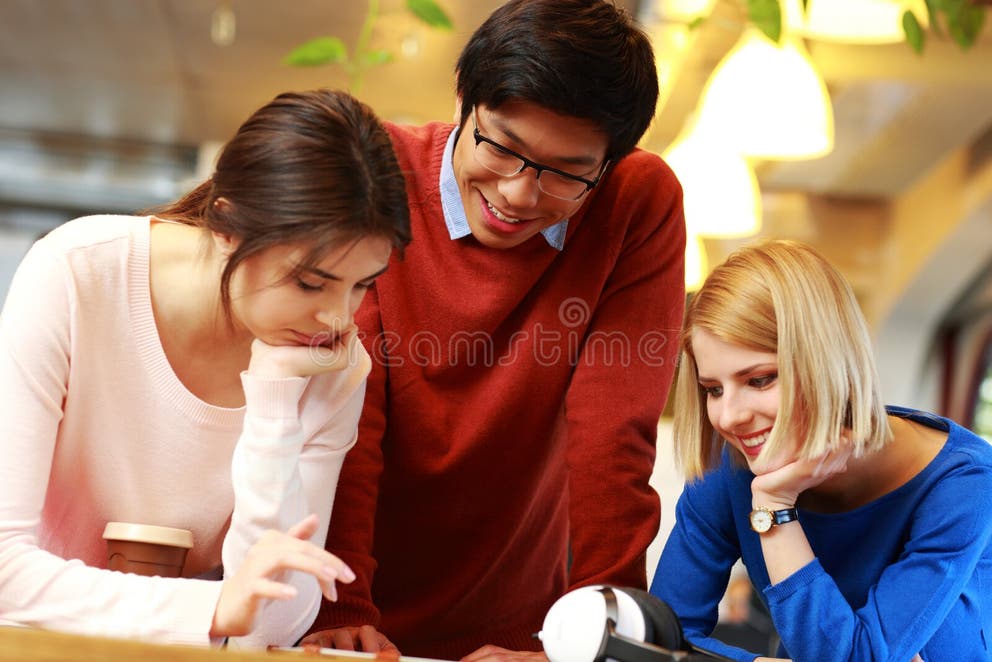 Students Using Tablet Computer Together Stock Photo - Image of sitting ...
