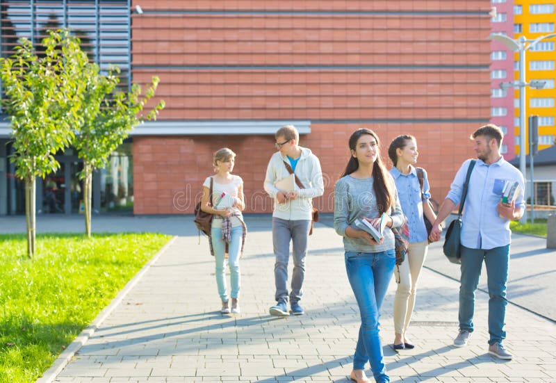 Students Walking Outside University Campus Stock Image - Image of ...