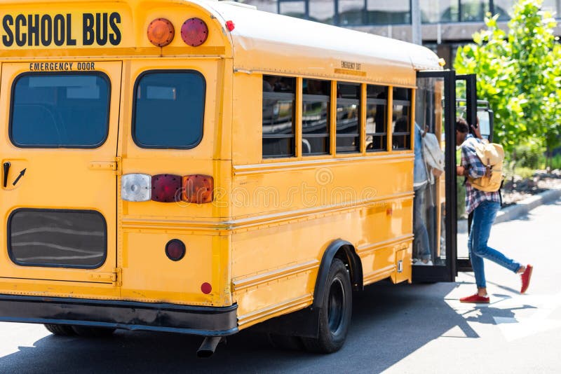 Students Walking into School Bus Stock Photo - Image of educational ...