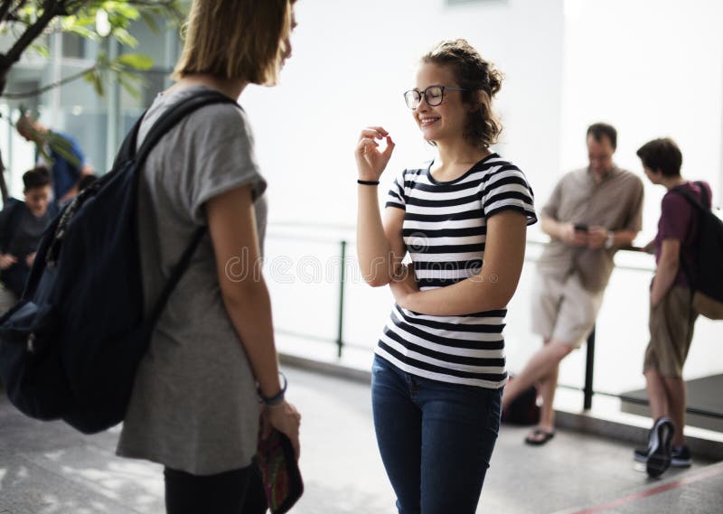 Students Women Standing Talking on Break Stock Photo - Image of girls ...