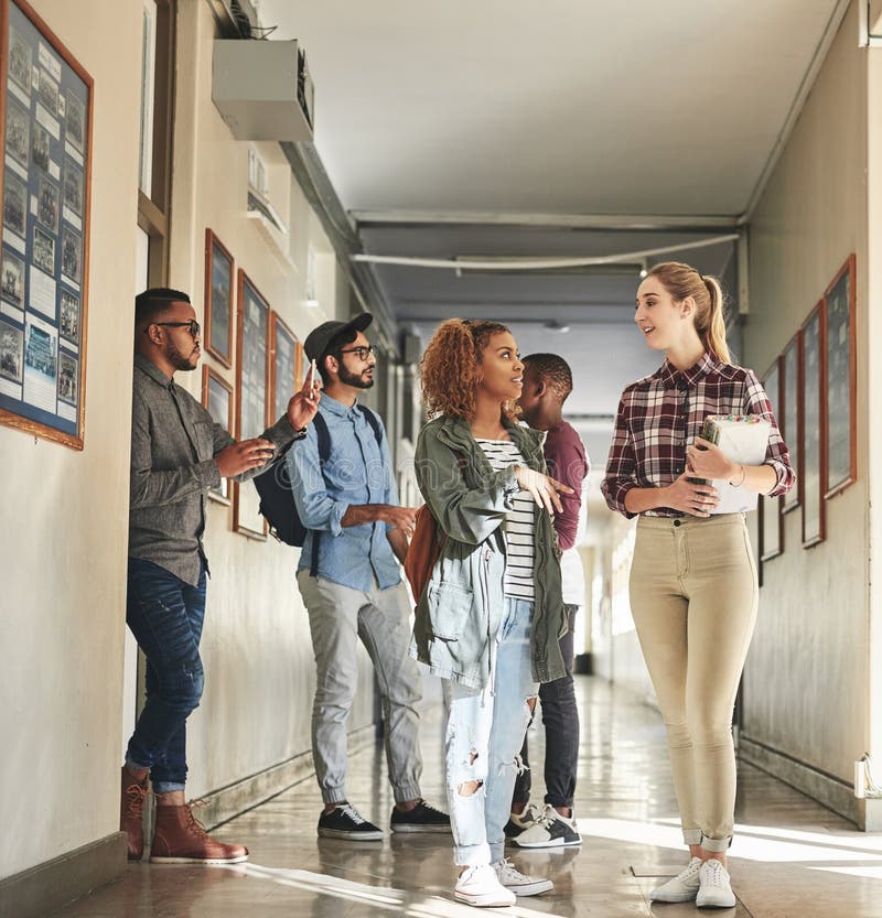 Students, Women and Talking in Hallway at College, Learning and ...