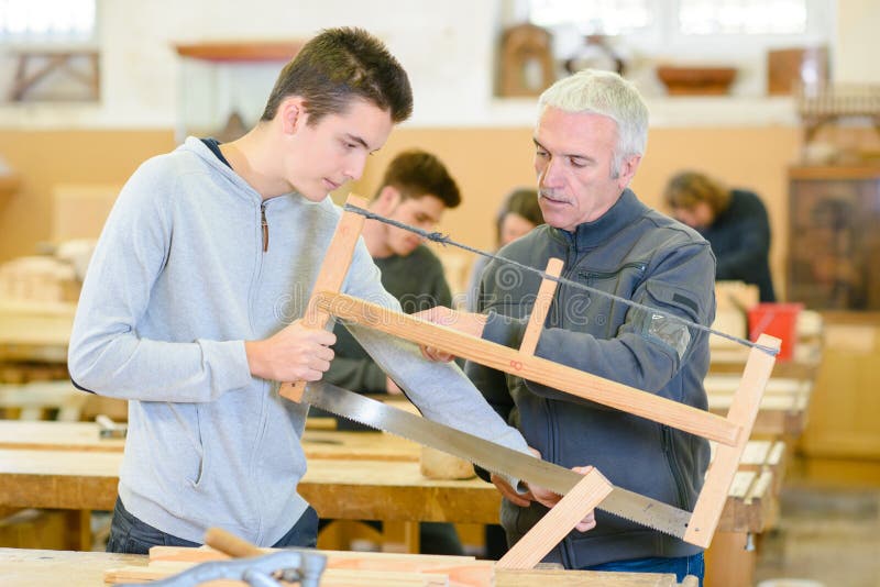 Students in woodwork class stock photo. Image of working - 249437146