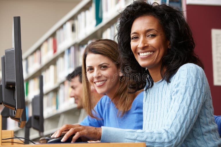 Students Working on Computers in Library Stock Photo - Image of college ...