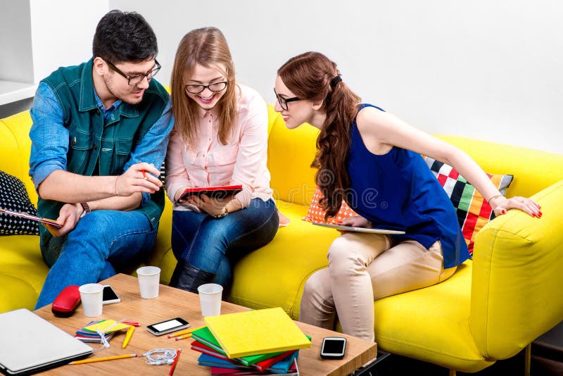 Students Working on the Couch Stock Image - Image of digital ...