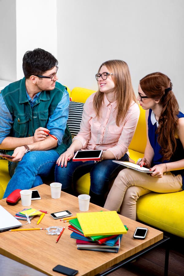 Students Working on the Couch Stock Image - Image of digital ...