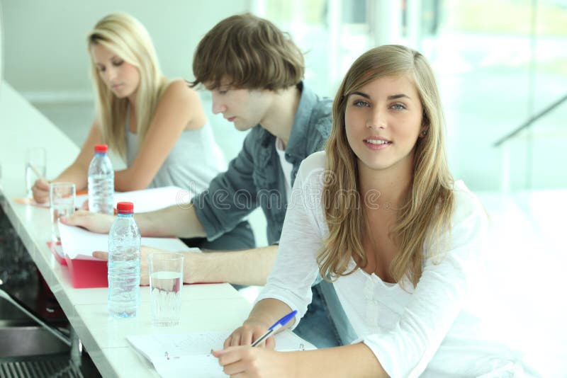 Students Working on a Project Stock Image - Image of bottle, desk: 30018657