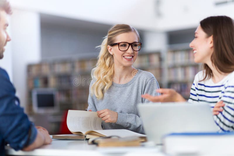 Students Working in the Library at Campus Stock Image - Image of people ...