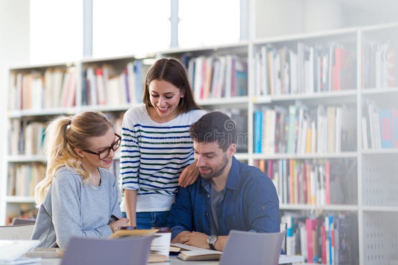 Students Working in the Library at Campus Stock Photo - Image of campus ...