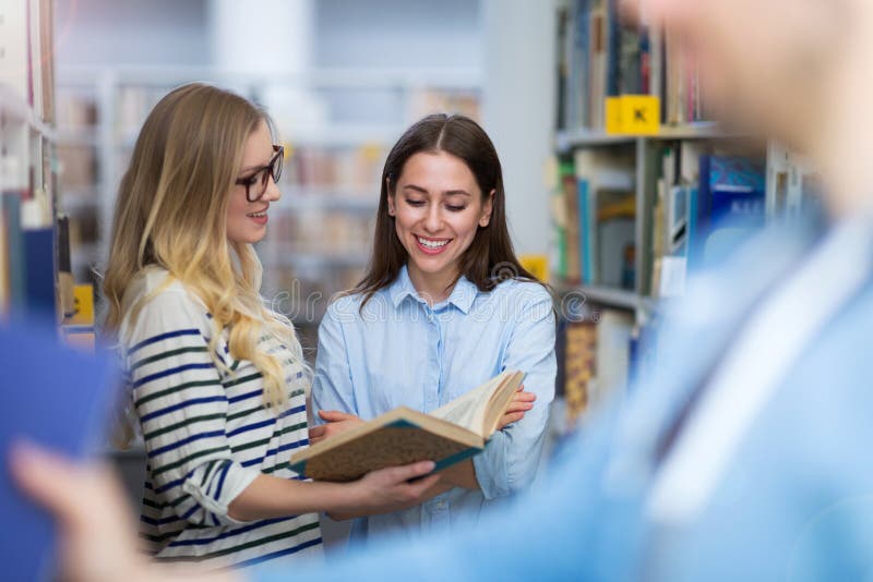 Students Working in the Library at Campus Stock Image - Image of ...