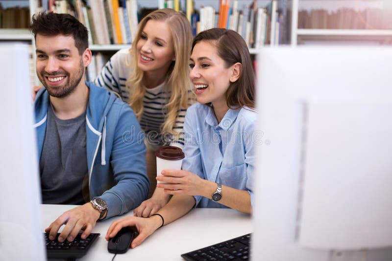 Students Working in the Library at Campus Stock Image - Image of people ...