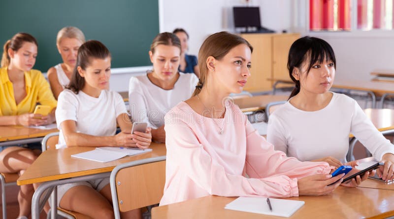 Students Working in Pairs Using Phones Stock Photo - Image of internet ...