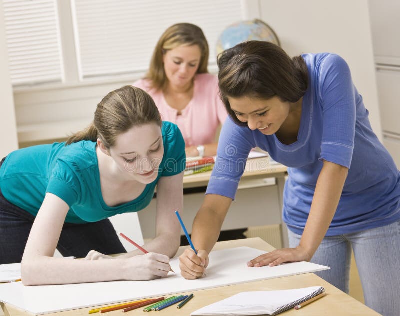 Students Working on Project in Classroom Stock Image - Image of solemn ...