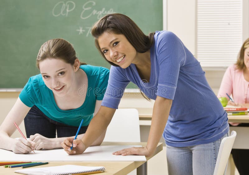 Students Working on Project in Classroom Stock Photo - Image of serious ...