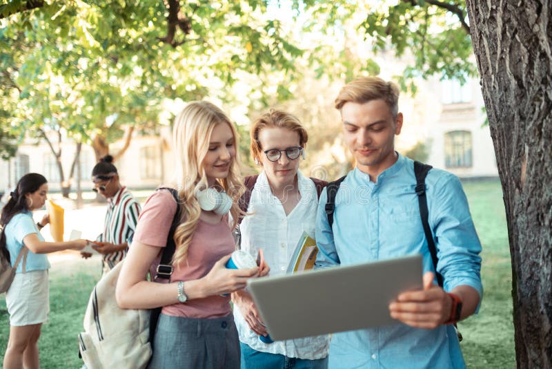 Students Working on Their University Project Together. Stock Image ...