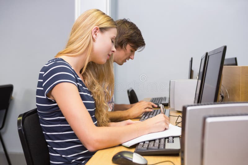 Students Working Together on Computer Stock Photo - Image of people ...