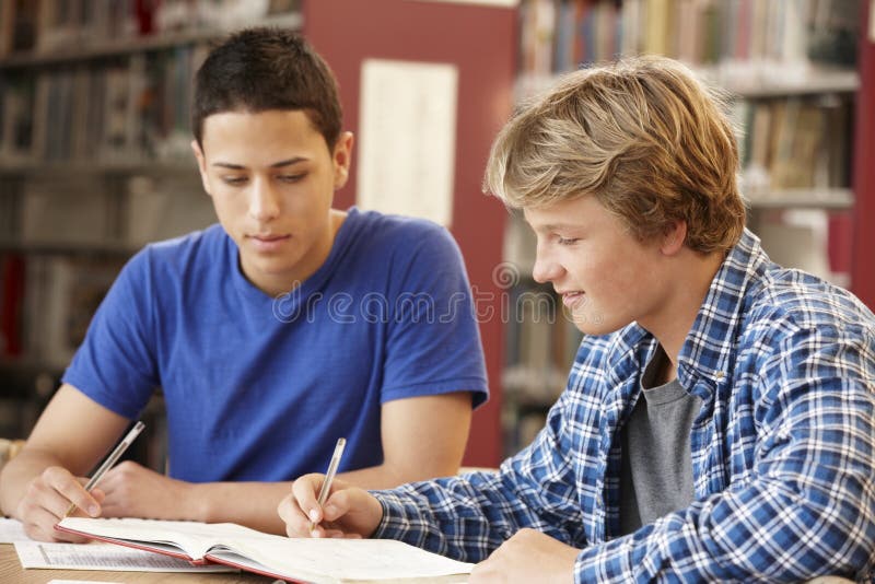 2 Students Working Together in Library Stock Image - Image of ...