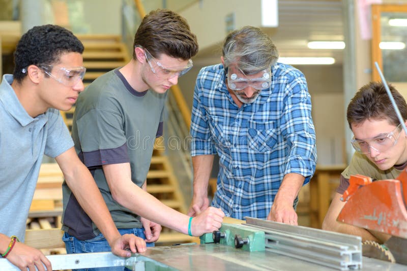 Students in the workshop stock image. Image of protection - 148698695
