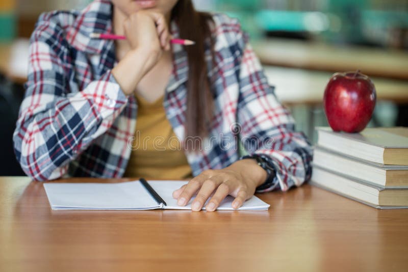 Students Write Books in the Library, Education Concept Stock Photo ...