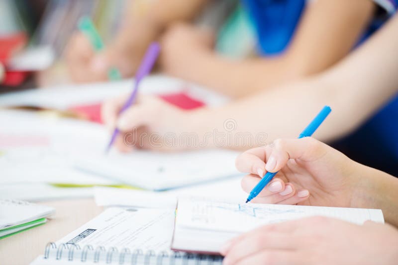 Students Writing In Classroom, Close Up Stock Image - Image of ...