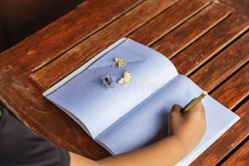 Students Writing on the Desk Stock Image - Image of homework, notepad ...