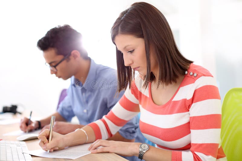 Students Writing Exam at School Stock Image - Image of class, teens ...
